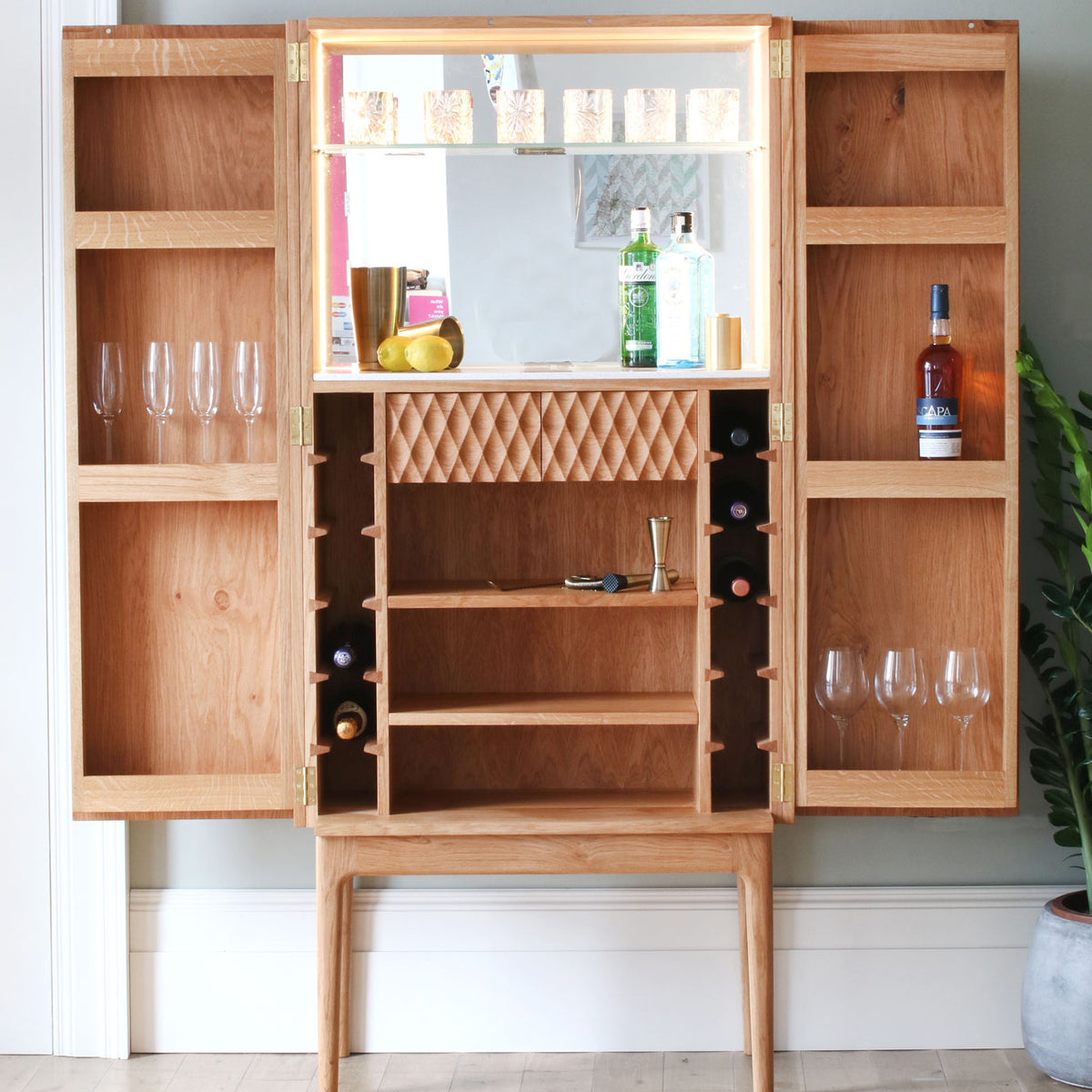 Drinks Cabinet with sculpted doors - Nick James Design